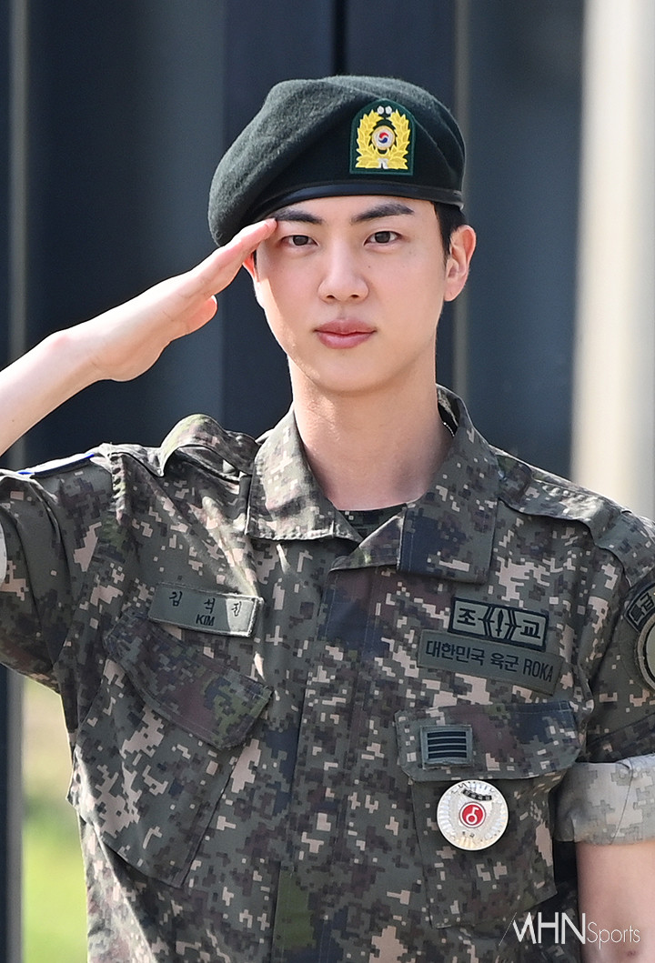 BTS's Jin Lights Up Paris at Olympic Torch Relay